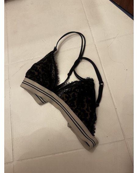 old worn designer bra